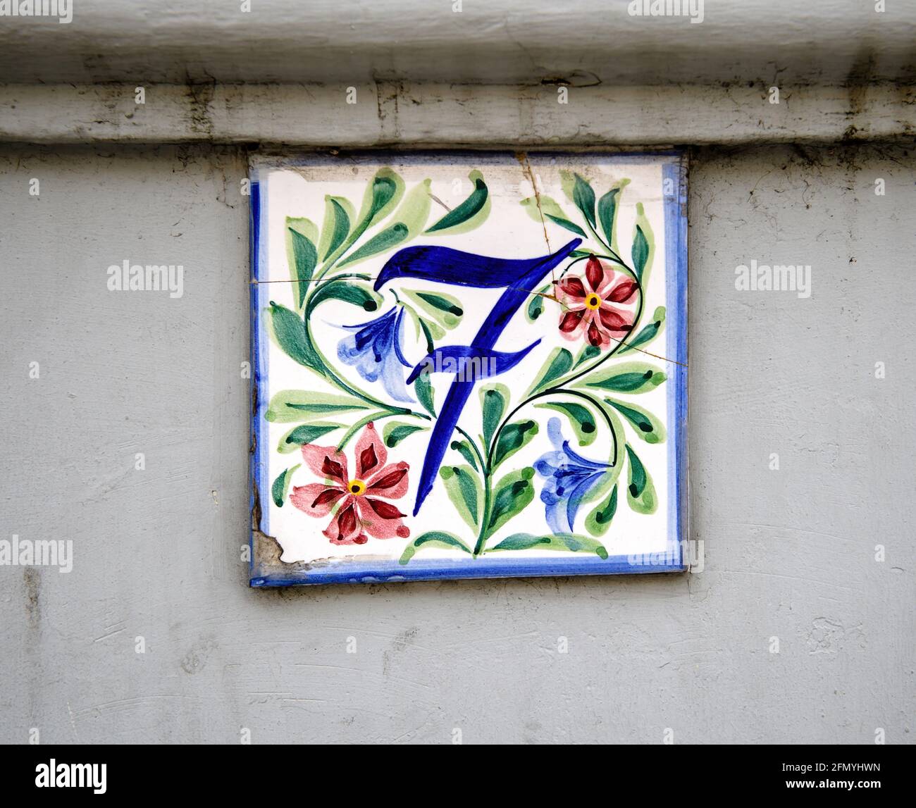 Beautiful painted number 7 on the house tile Stock Photo - Alamy