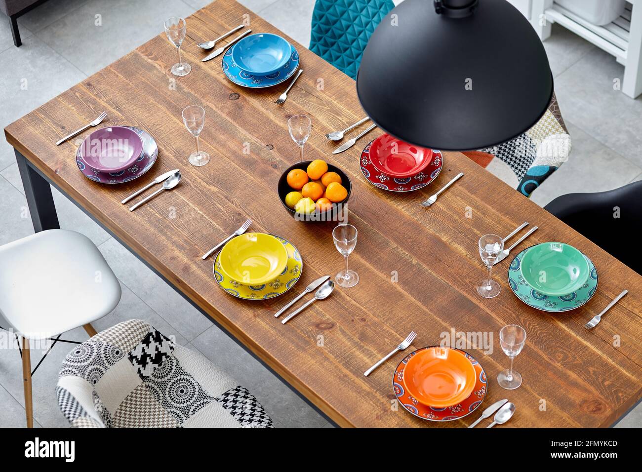 A modern wooden dinning table prepared for dinner. Top view Stock Photo ...