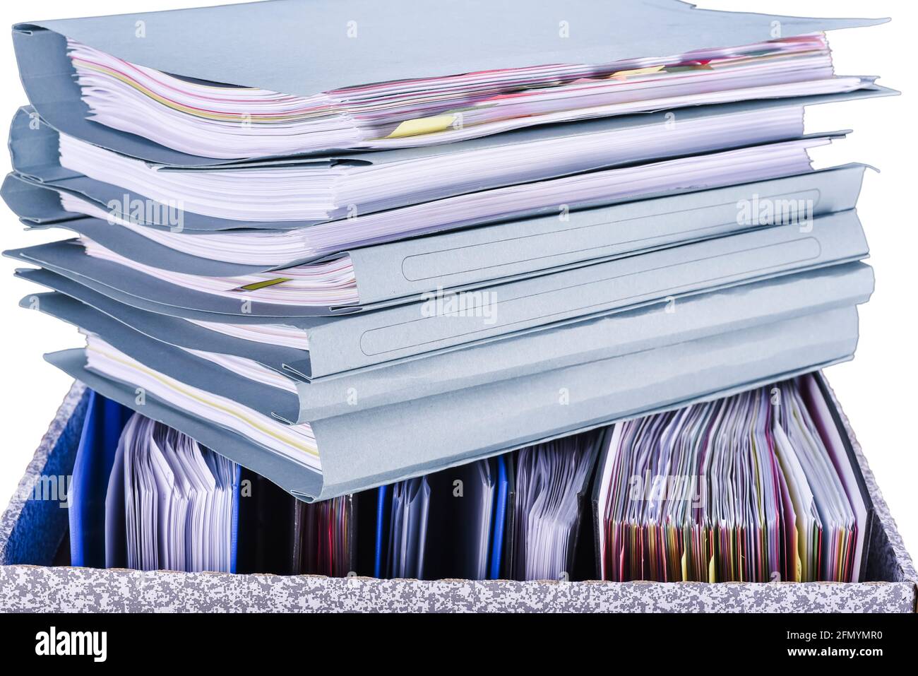 Documents and files folders are placed in a paper box and pile of extra ...