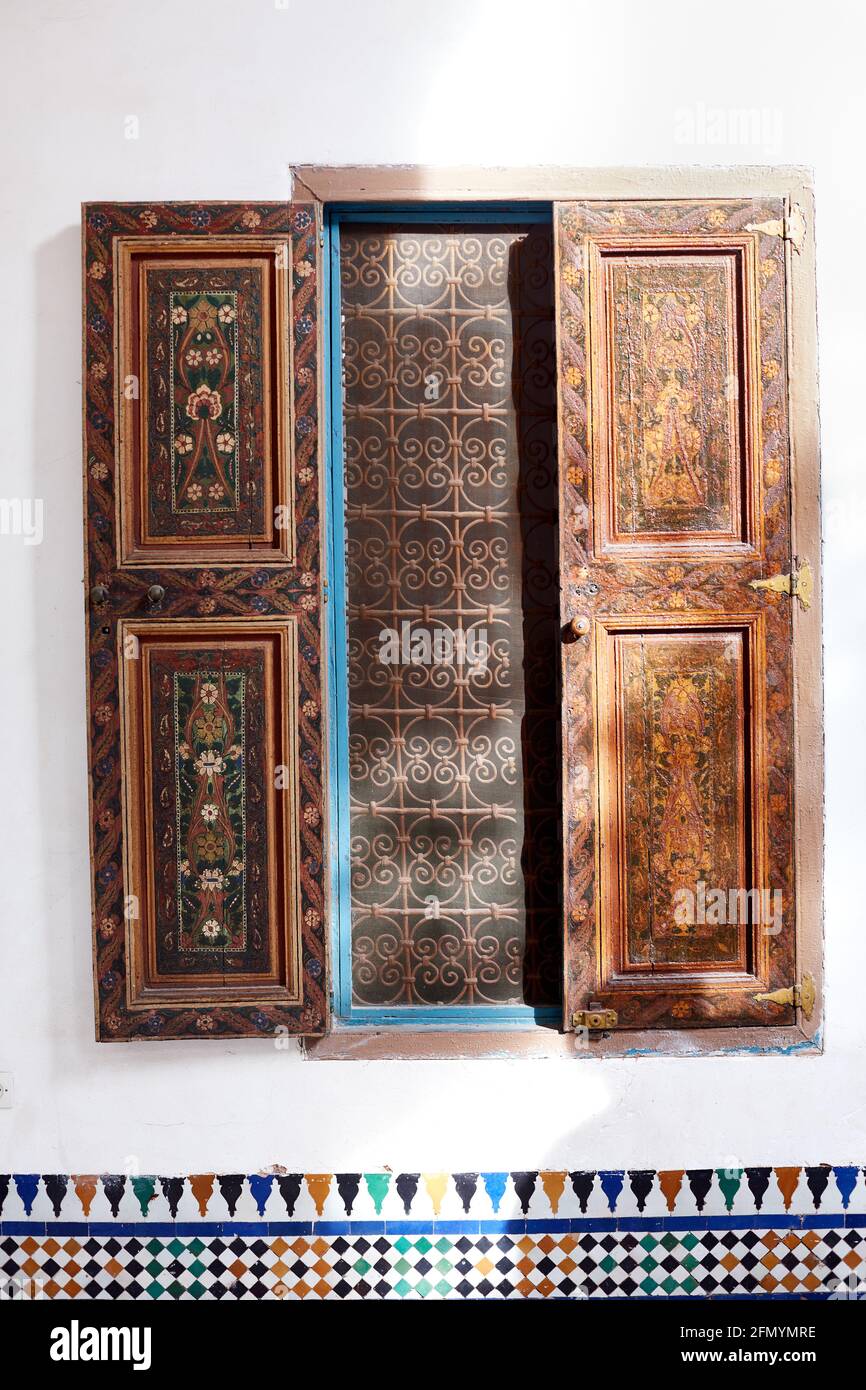 Window with decorative shutters at the El Bahia Palace.It is visited by ...
