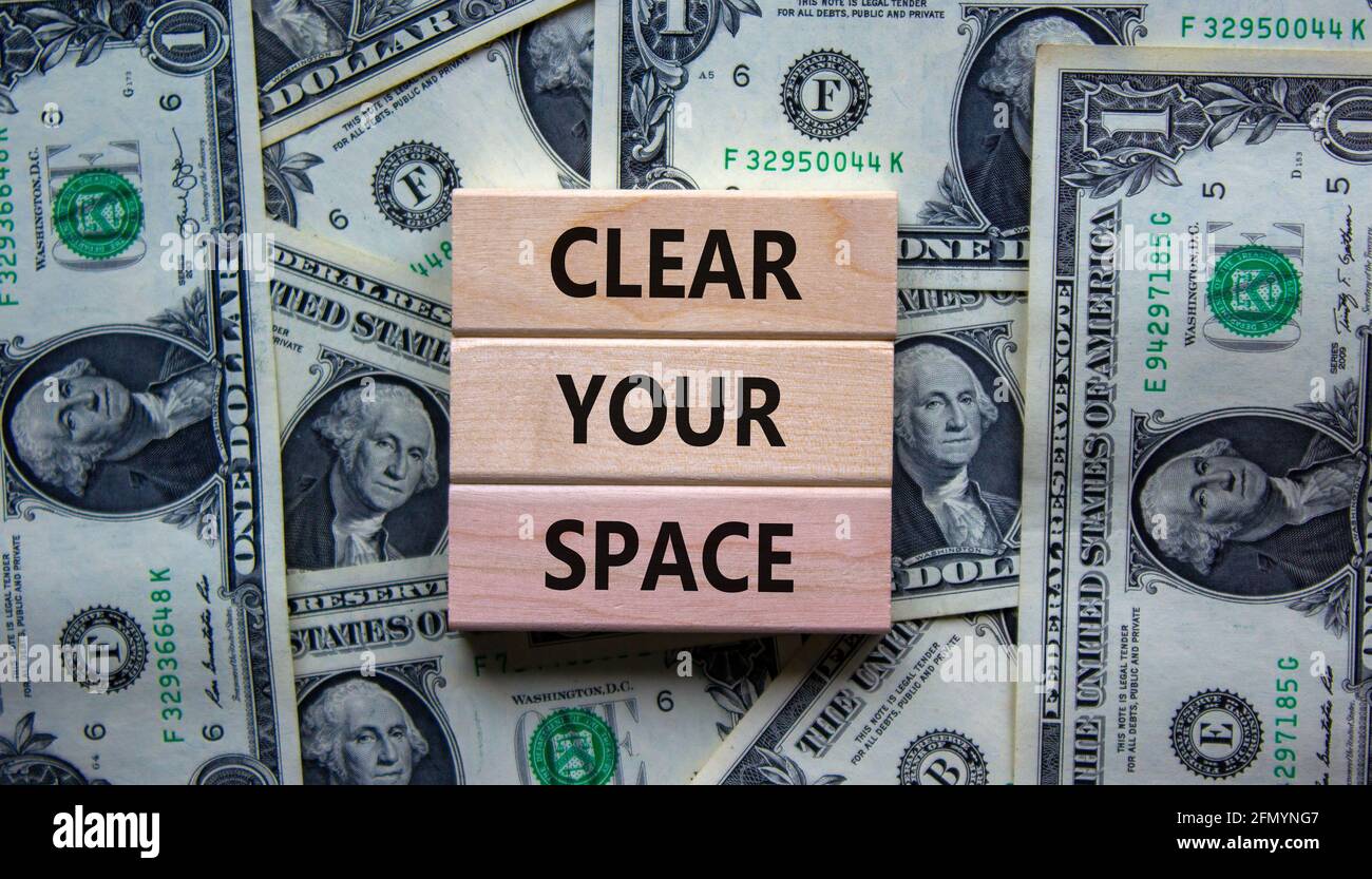 Clear your space symbol. Wooden blocks with words 'Clear your space ...