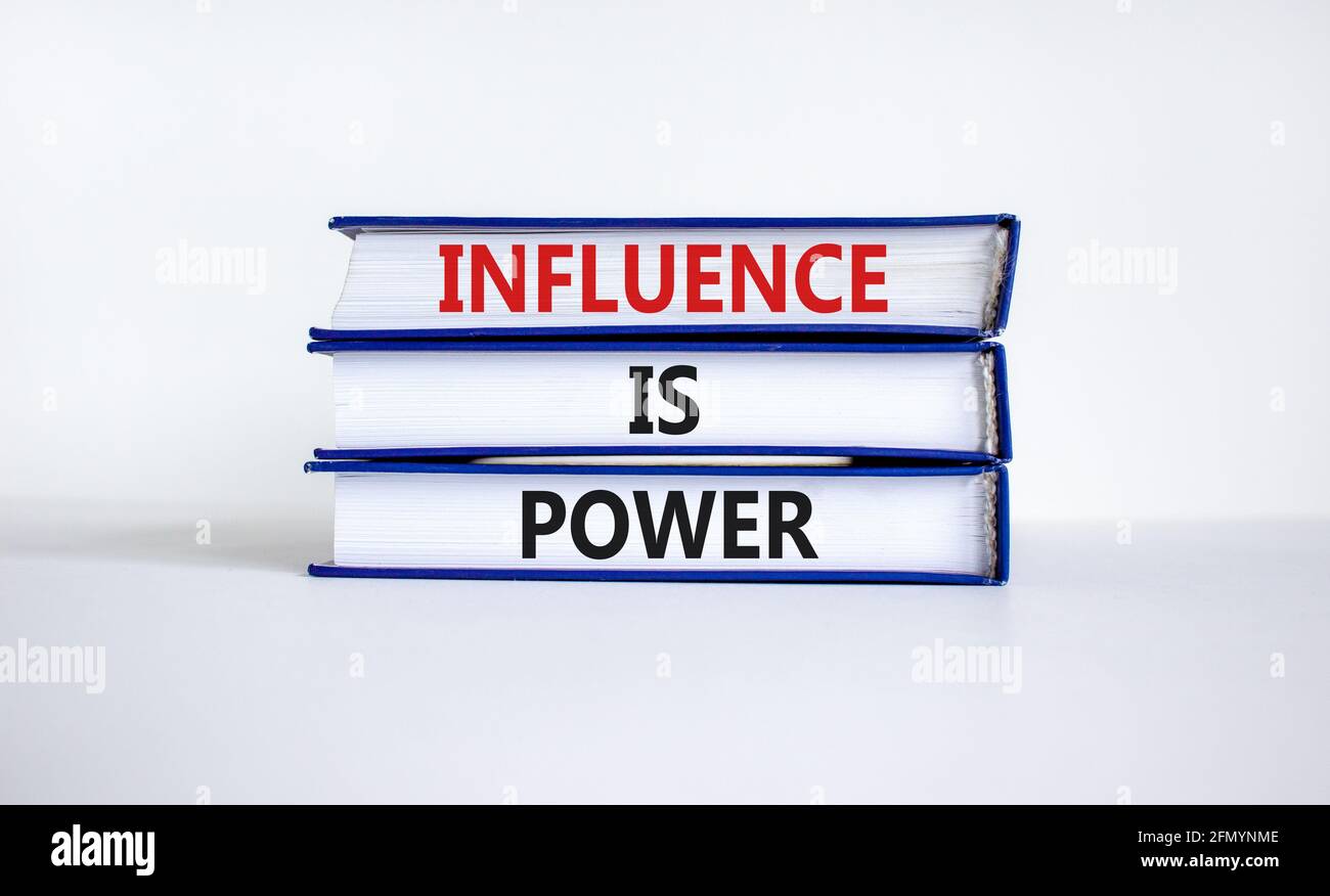 Influence is power symbol. Books with words 'Influence is power ...