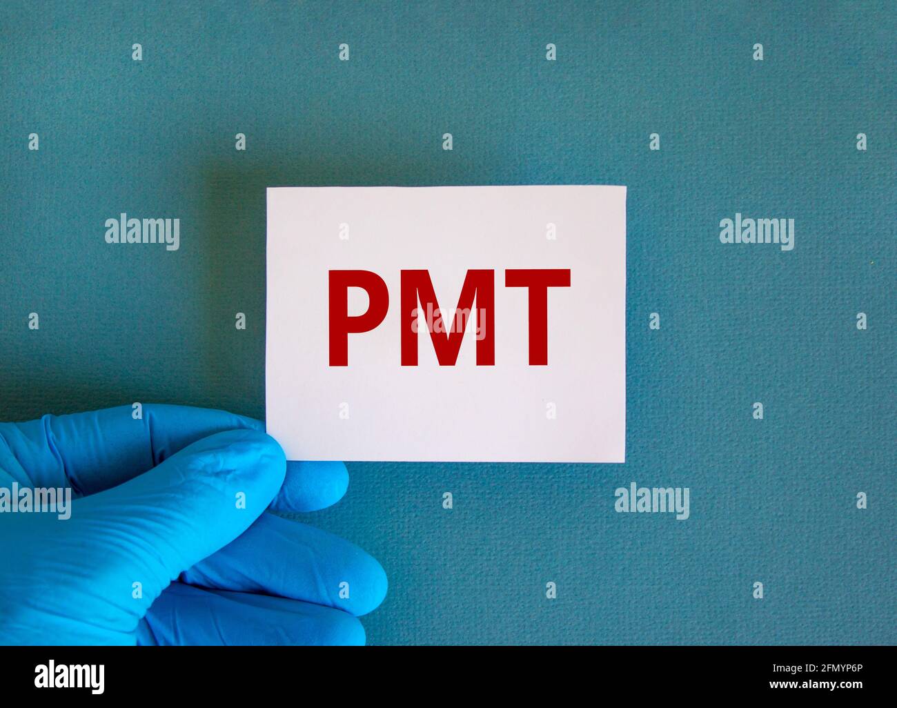 Medical and PMT, premenstrual tension symbol. White card with the word ...