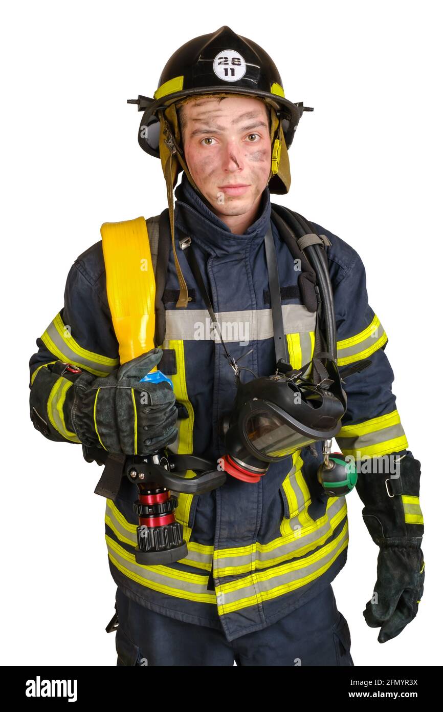 Young brave man in uniform and hardhat of firefighter with fire hose ...