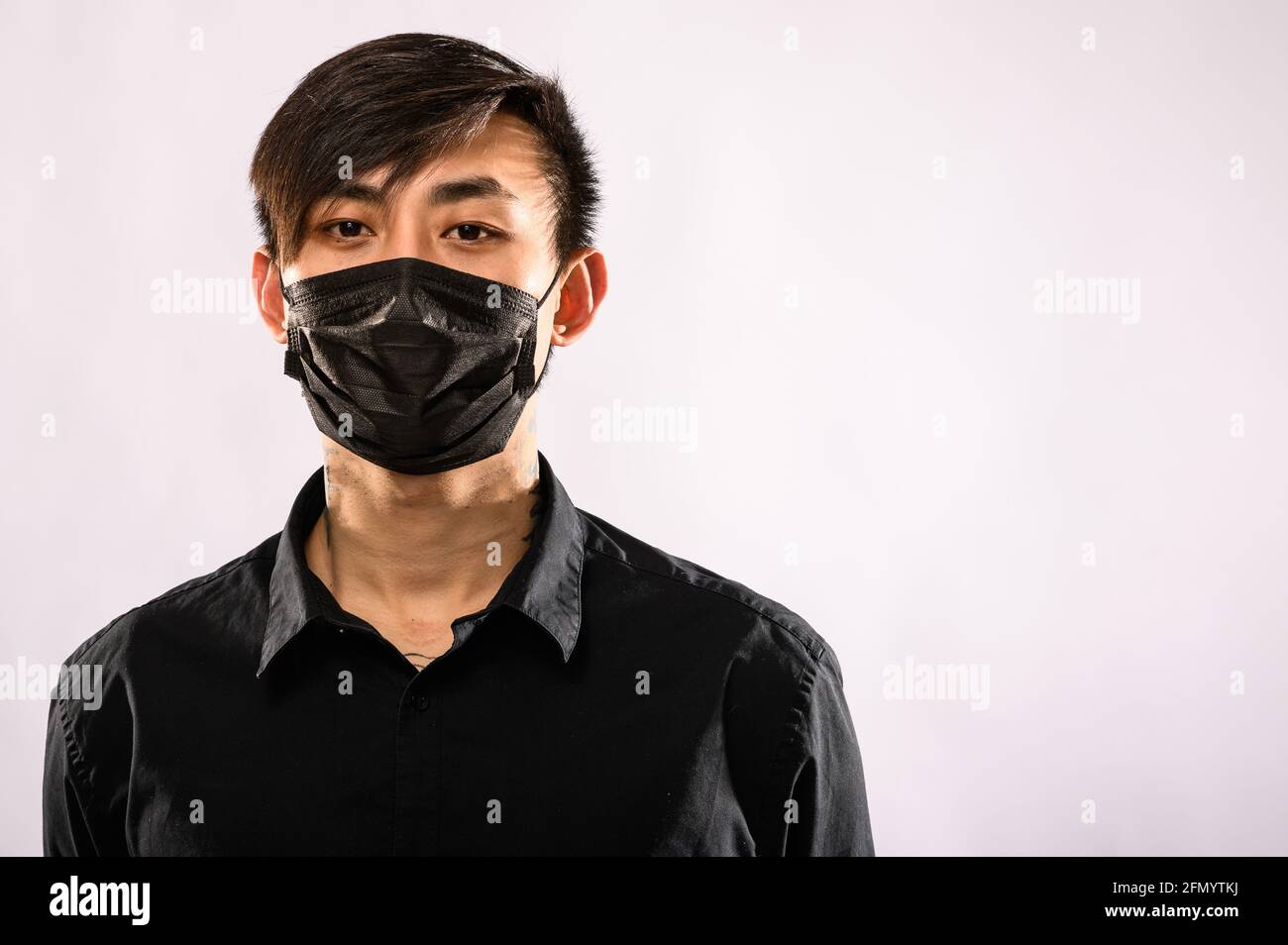 Asian man with medical face mask to protection the coronavirus. Young ...