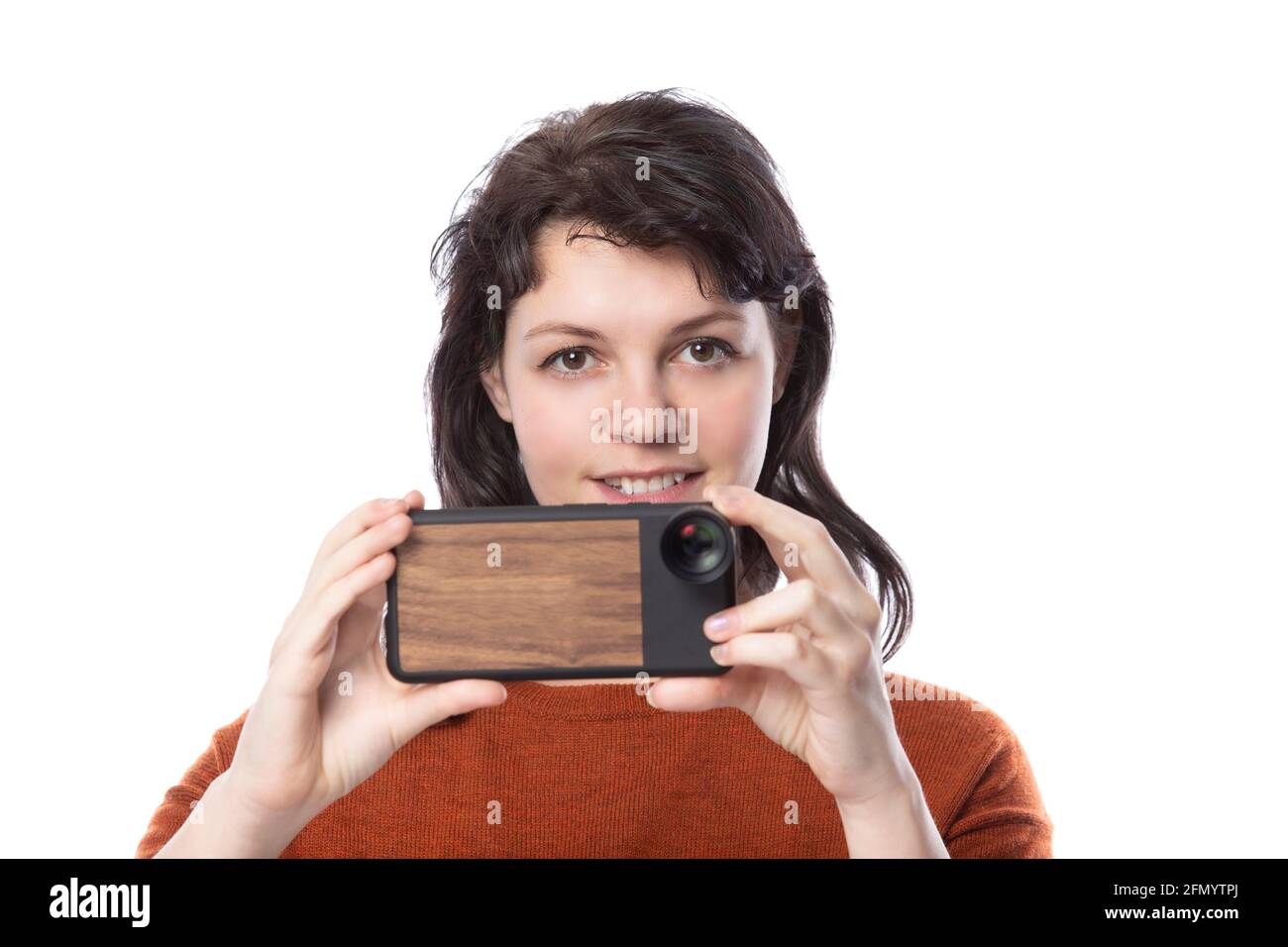 Female tourist or photographer doing mobile photography with a cell ...