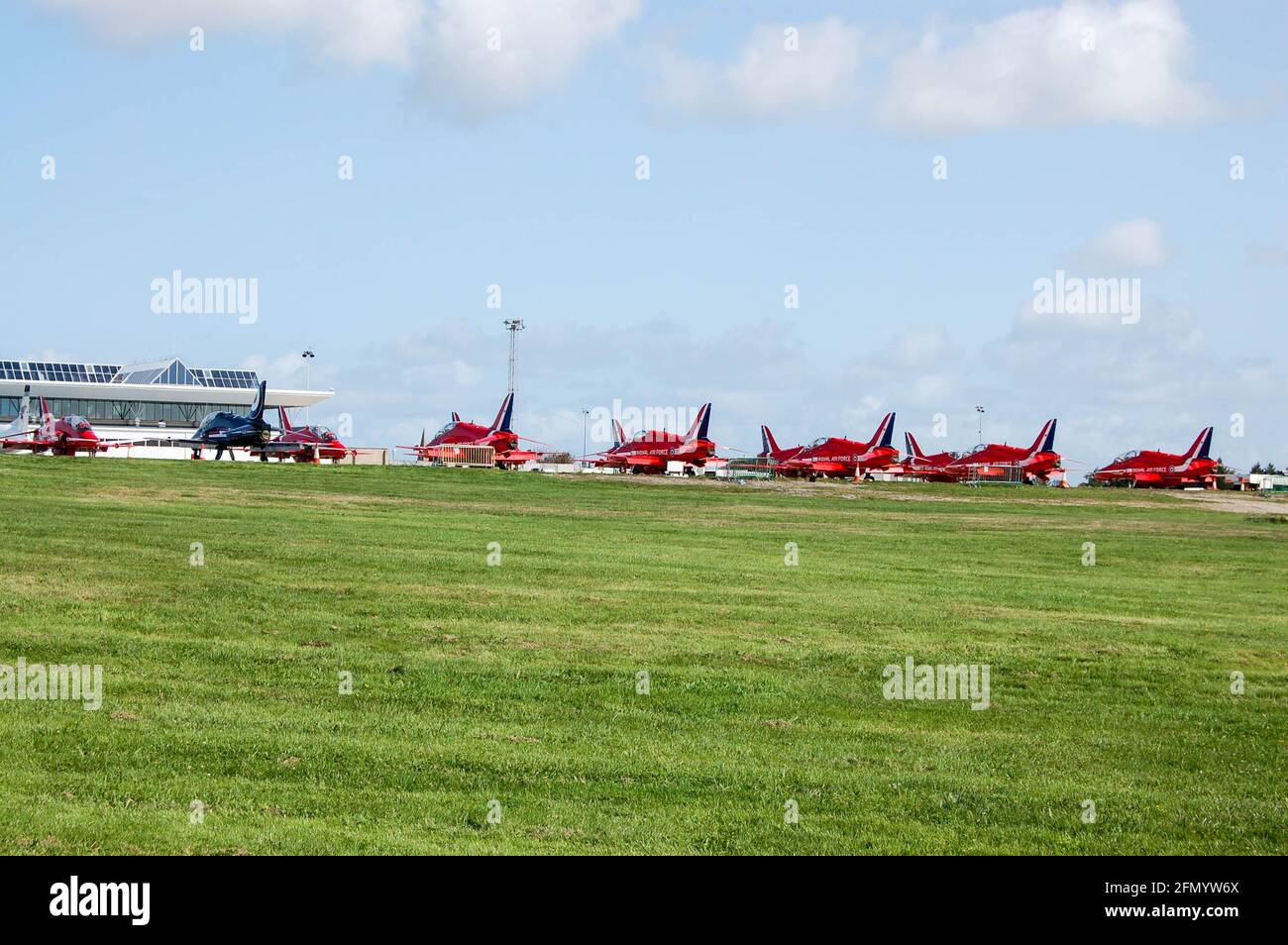 Red Arrows display team jersey airport Stock Photo - Alamy