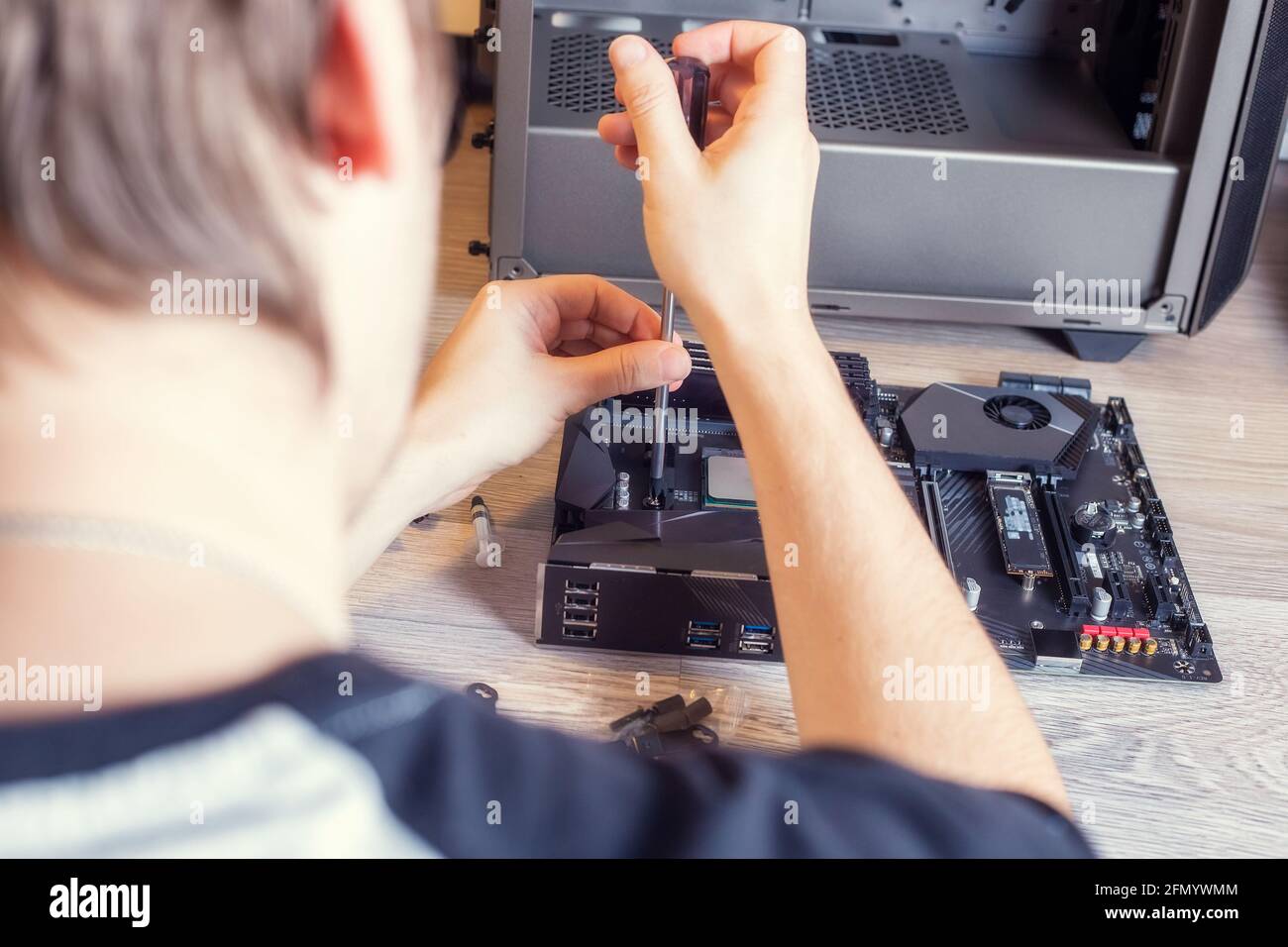 Installing a cooler on a personal computer processor. The process of ...