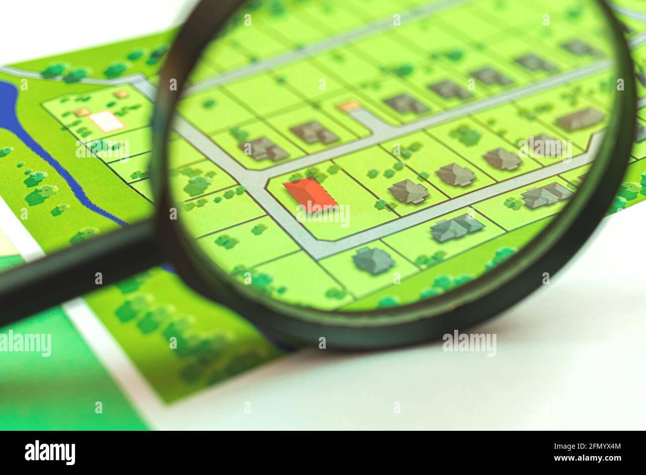 Search property with magnifying glass, office desk with map, real ...