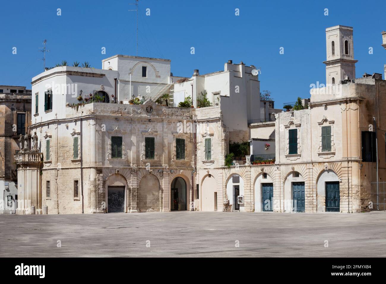 Old houses in the historic city of Lecce, Italy. White buildings in the ...