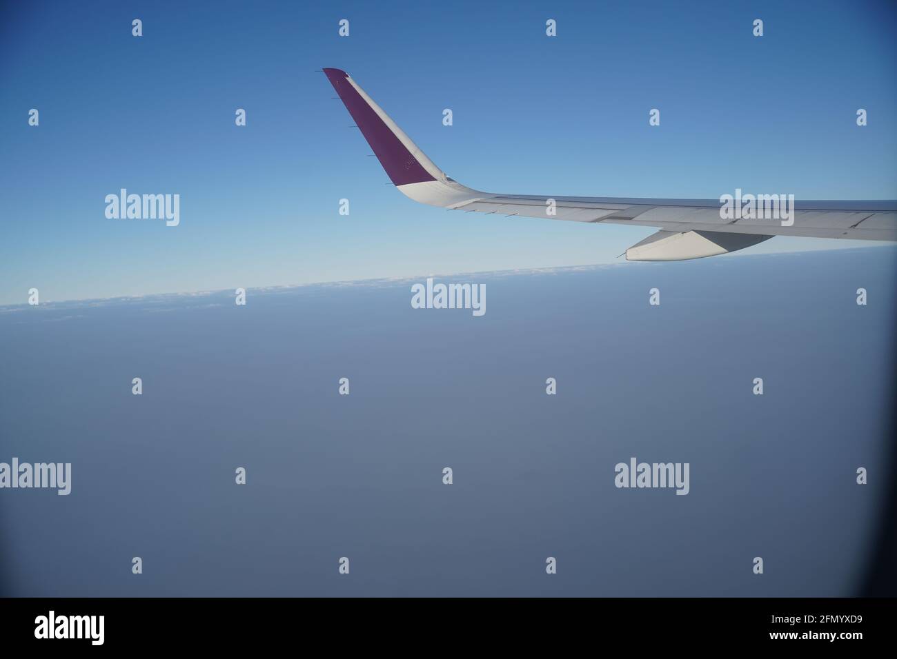 Winter mountains from the plane window Stock Photo - Alamy