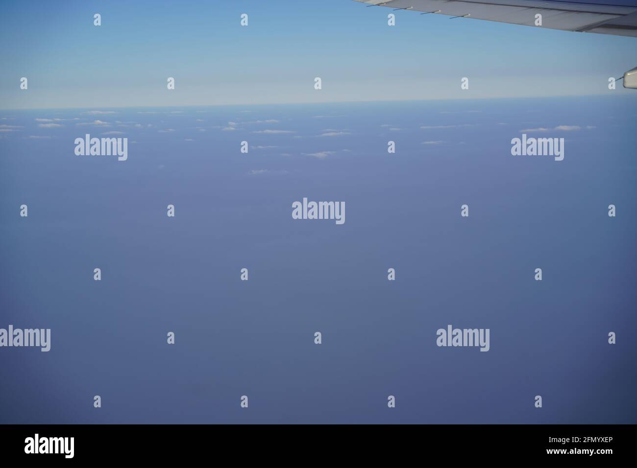 Winter mountains from the plane window Stock Photo - Alamy