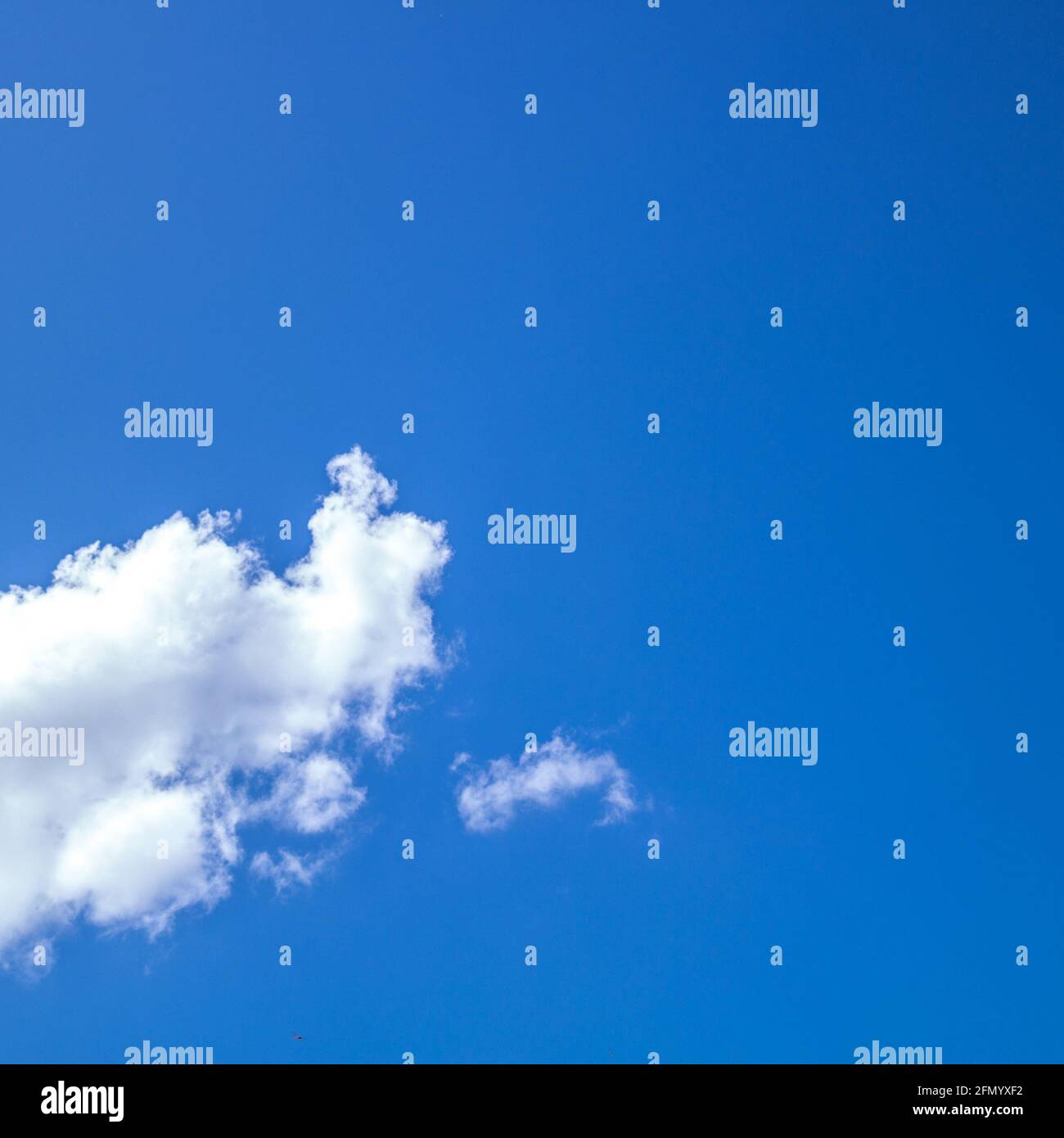 Blue cloudscape with cloud share Stock Photo - Alamy