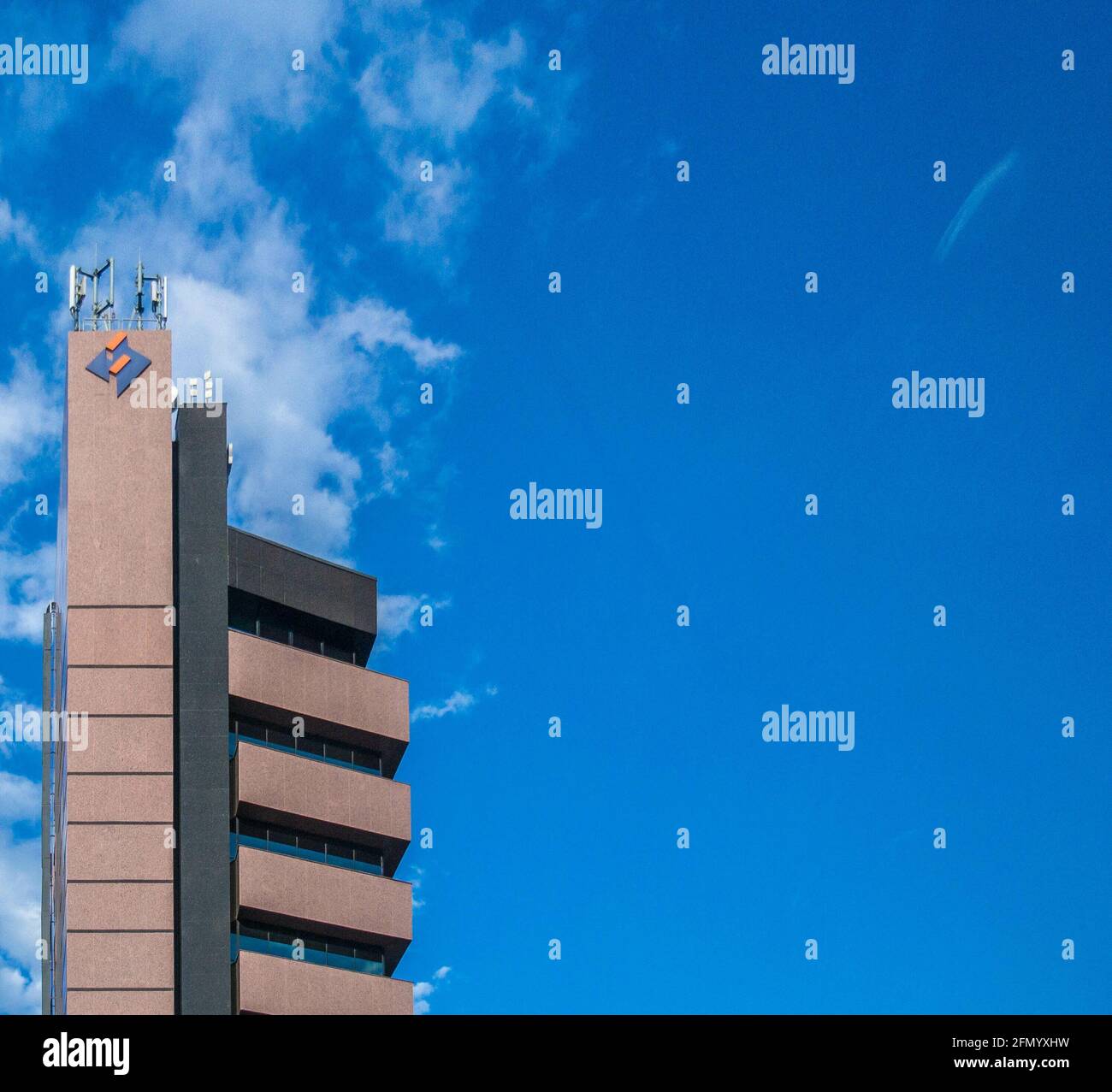 Beautiful brown building with a modern exterior design Stock Photo - Alamy