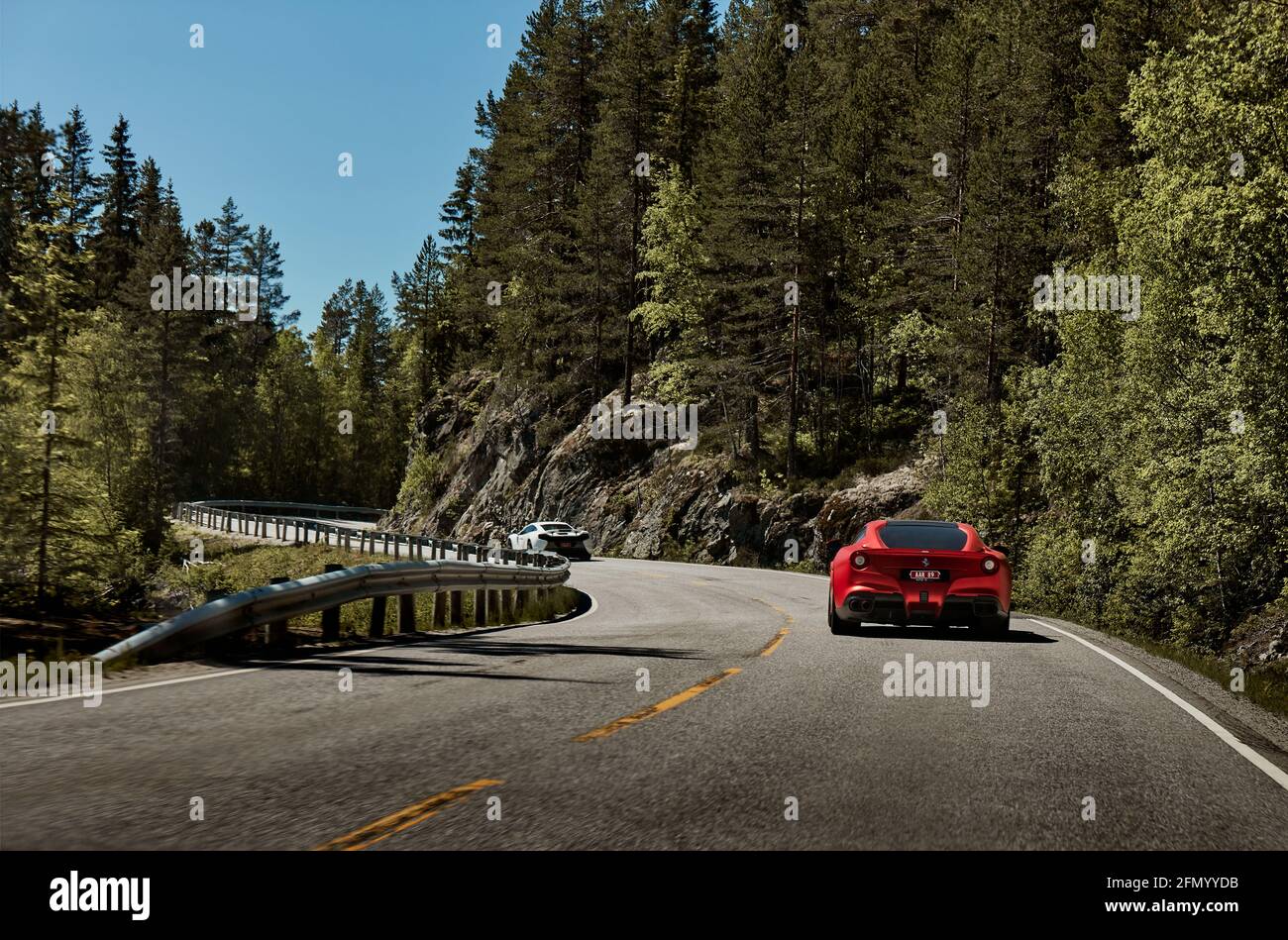 Red Ferrari F12 and white McLaren 650s on the road - Miland, Norway ...