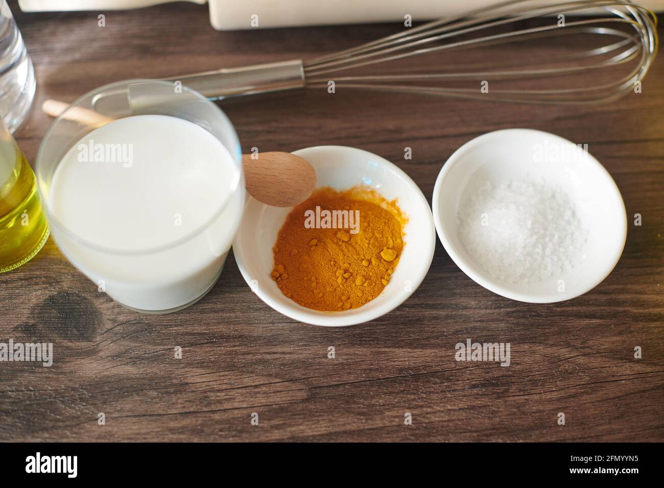 Top view of a kitchen table with bowl spice, oil, and spoons Stock ...