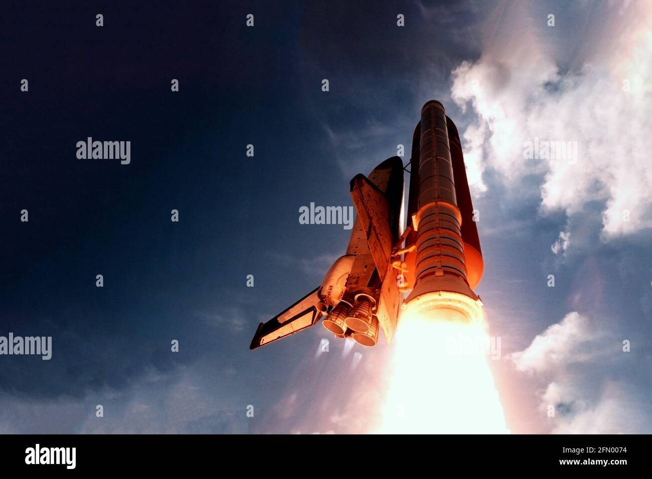 Rocket launch from below, into the sky. Elements of this image were ...