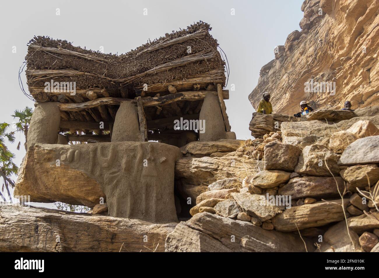 A toguna (palaver hut), meeting house for the elders at the centre of ...