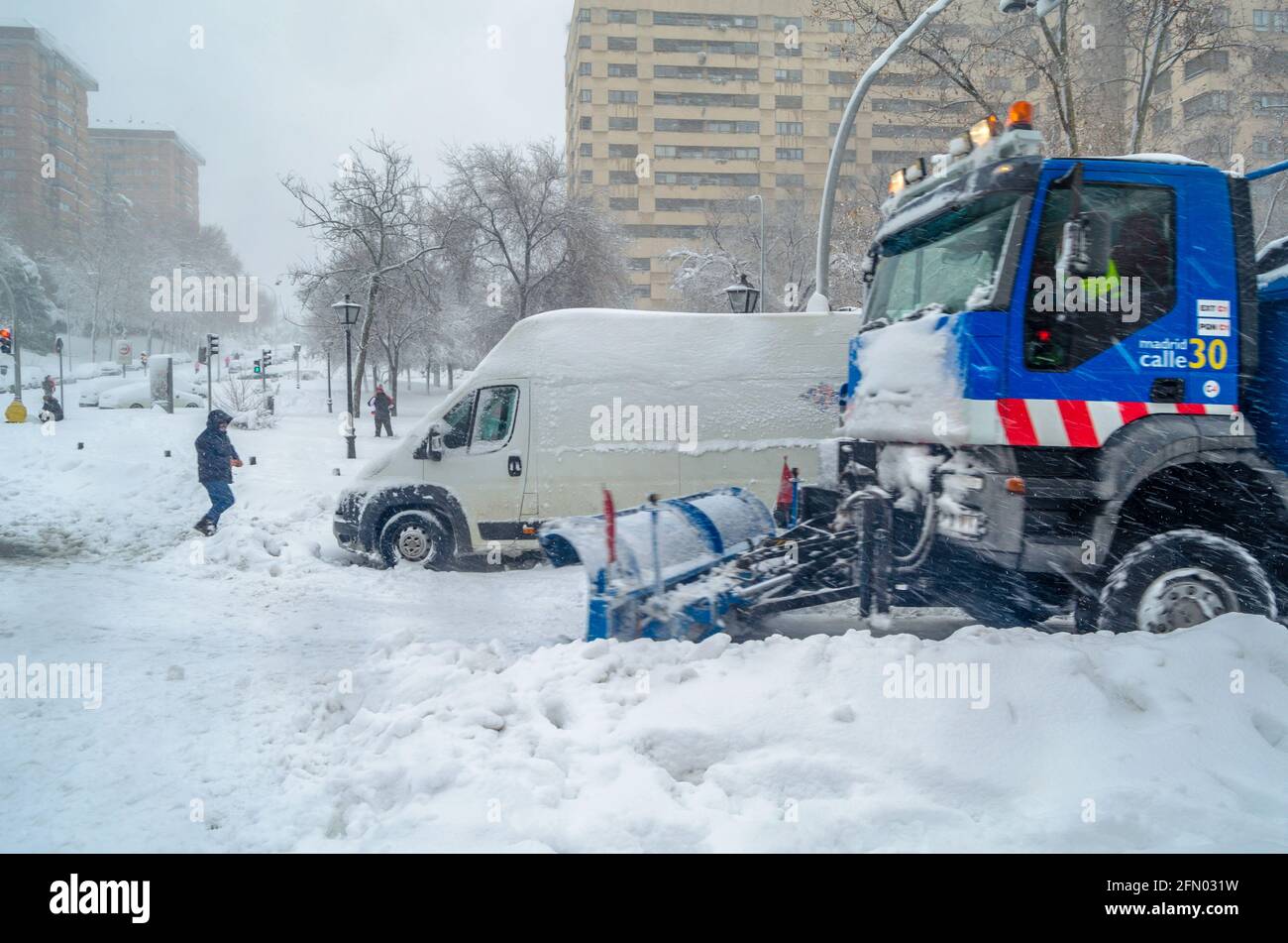 MADRID, SPAIN – JANUARY 9, 2021: Snowplow clearing streets during Storm ...