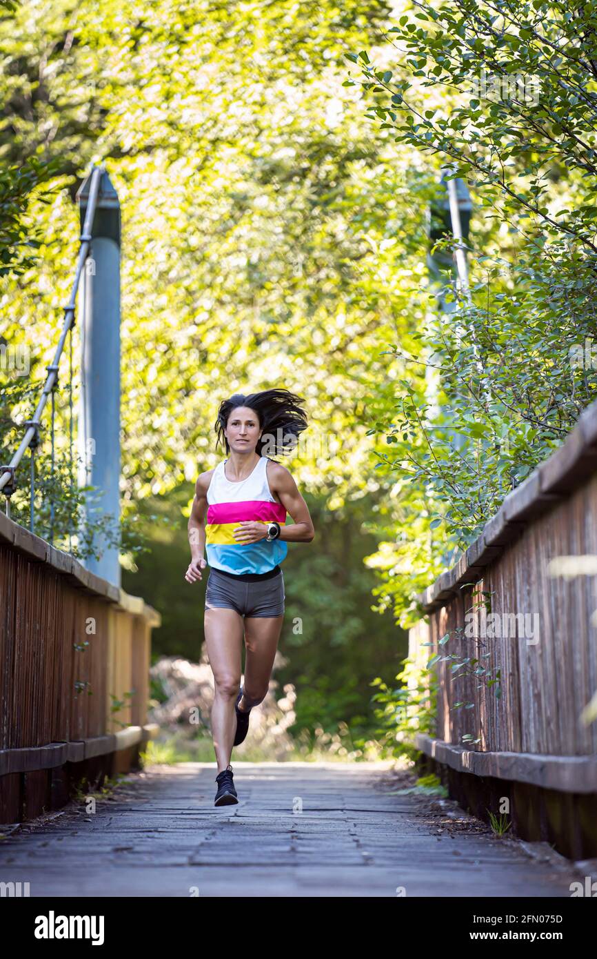 Girl running in nature, it is her healthy and free lifestyle Stock ...