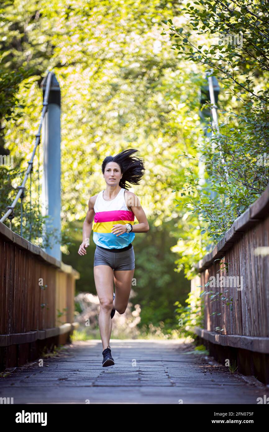 Girl running in nature, it is her healthy and free lifestyle Stock ...