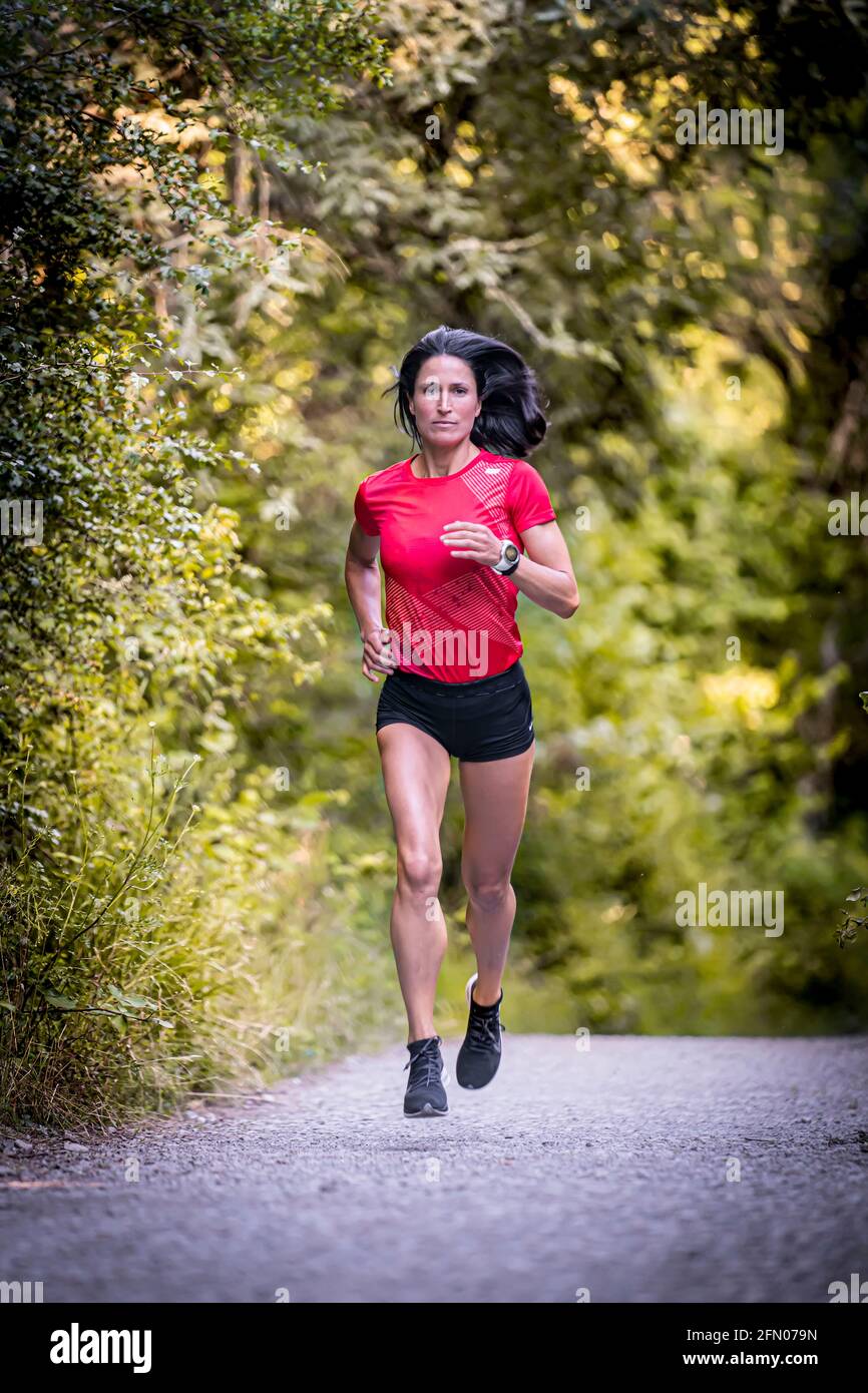 Girl running in nature, it is her healthy and free lifestyle Stock ...