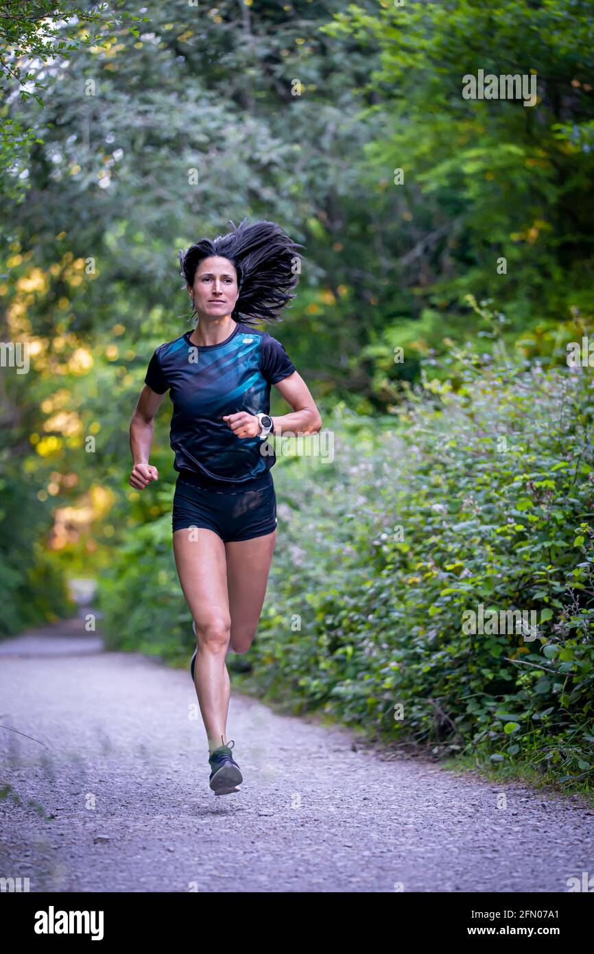 Girl running in nature, it is her healthy and free lifestyle Stock ...