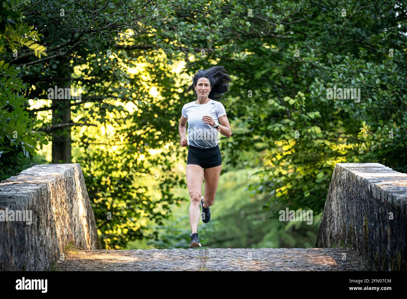 Girl running in nature, it is her healthy and free lifestyle Stock ...