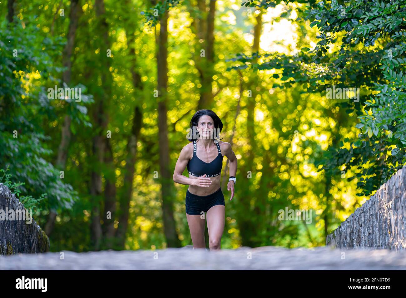 Girl running in nature, it is her healthy and free lifestyle Stock ...
