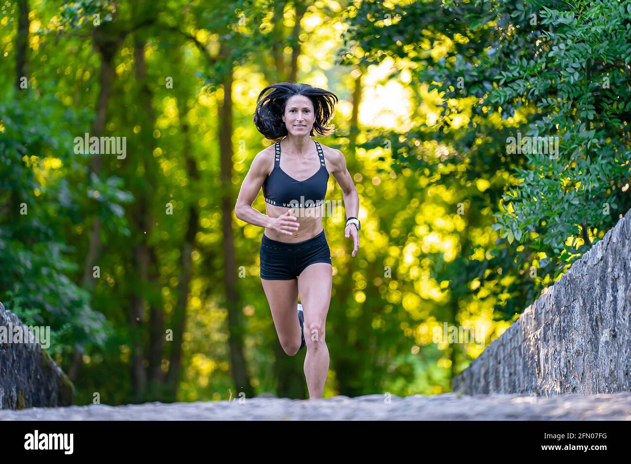 Girl running in nature, it is her healthy and free lifestyle Stock ...