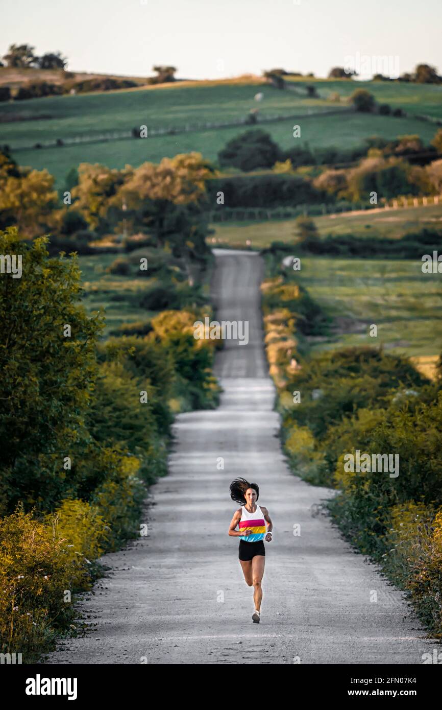 Girl running in nature, it is her healthy and free lifestyle Stock ...