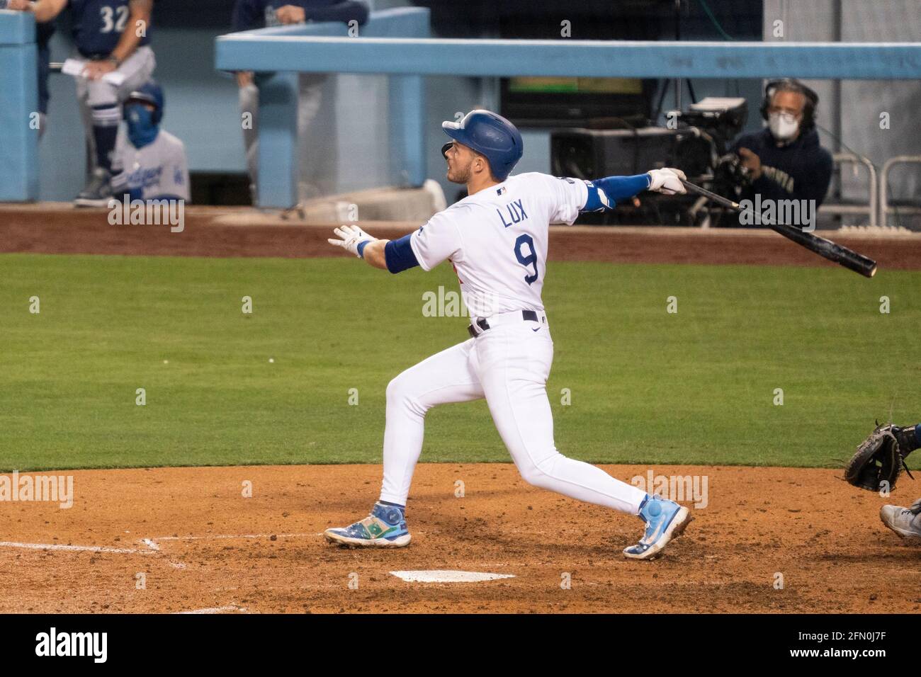 Los Angeles Dodgers second baseman Gavin Lux (9) watches his home run ...