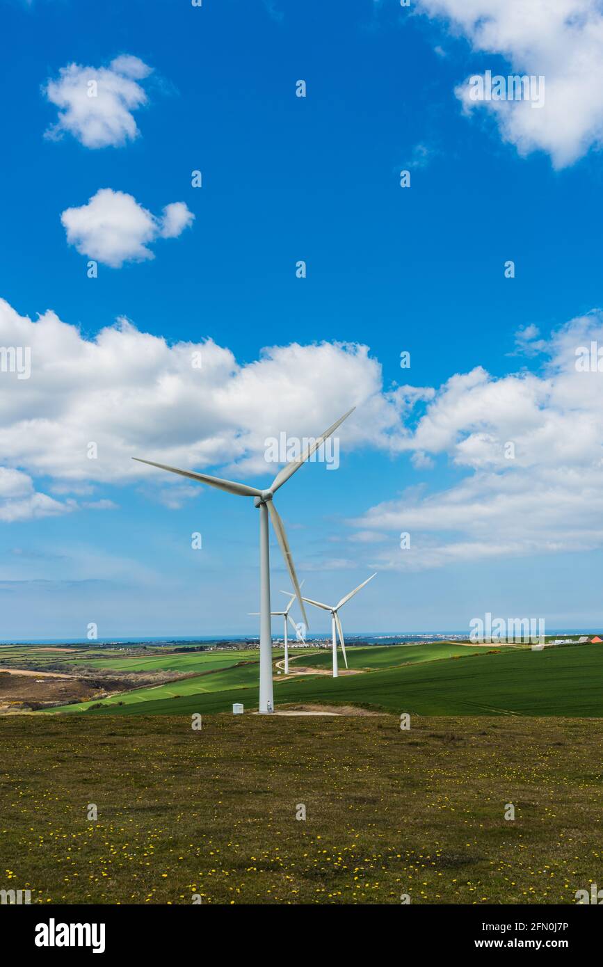Wind turbines on wind farms on Cornwall fields in England in Europe ...