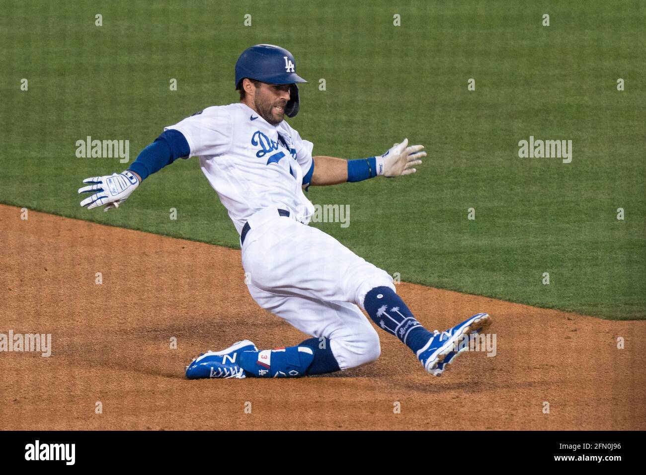 Los Angeles Dodgers left fielder Chris Taylor (3) slides into third ...