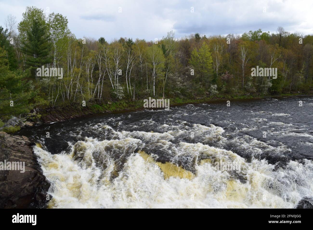 Scenic Maddington waterfalls in southern Quebec. This stream ends in ...
