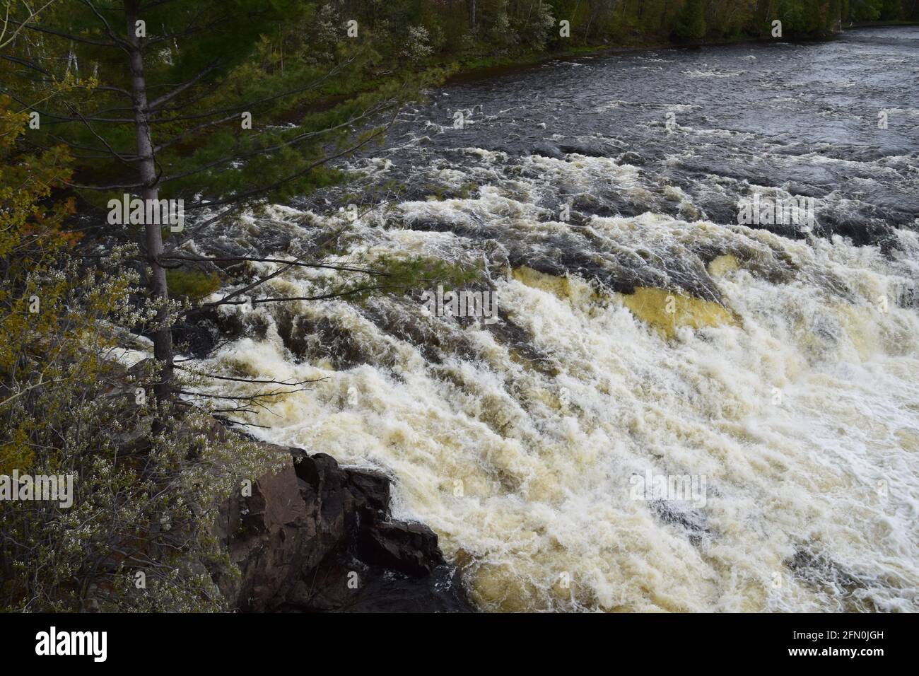 Scenic Maddington waterfalls in southern Quebec. This stream ends in ...