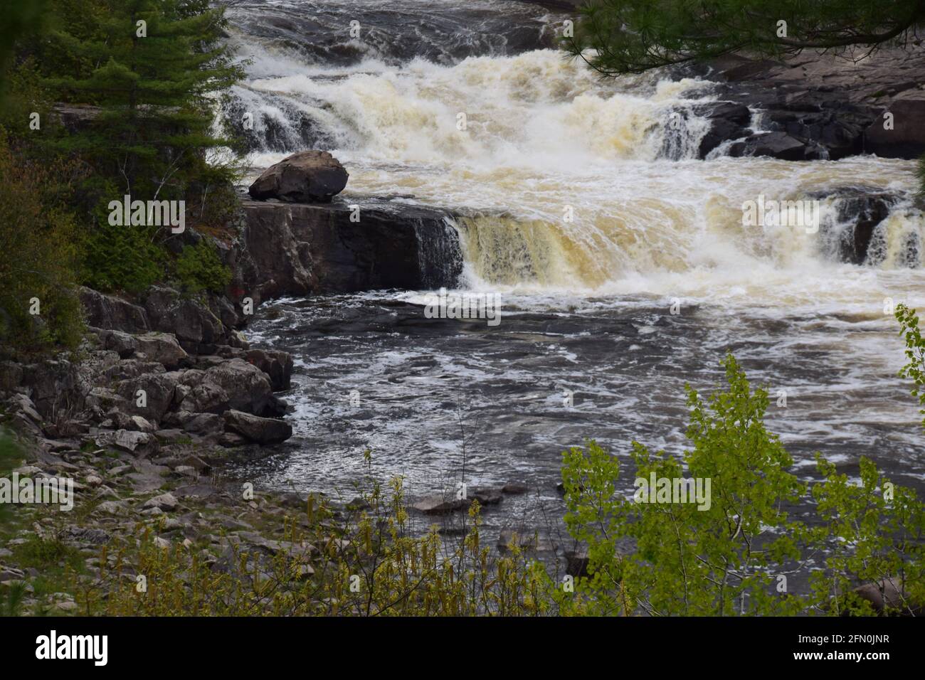 Scenic Maddington waterfalls in southern Quebec. This stream ends in ...