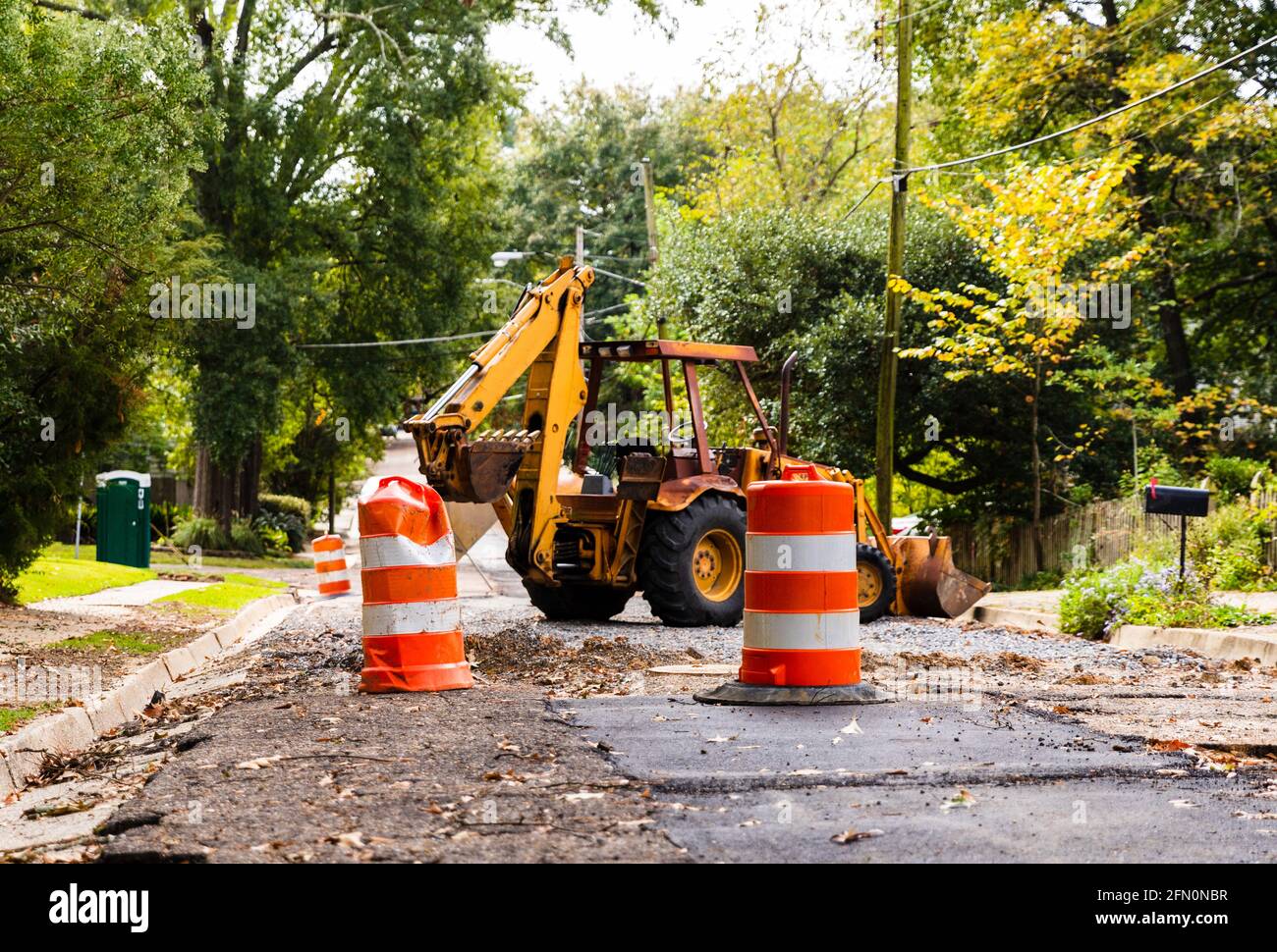 Road Construction equipment making repairs to street Stock Photo - Alamy