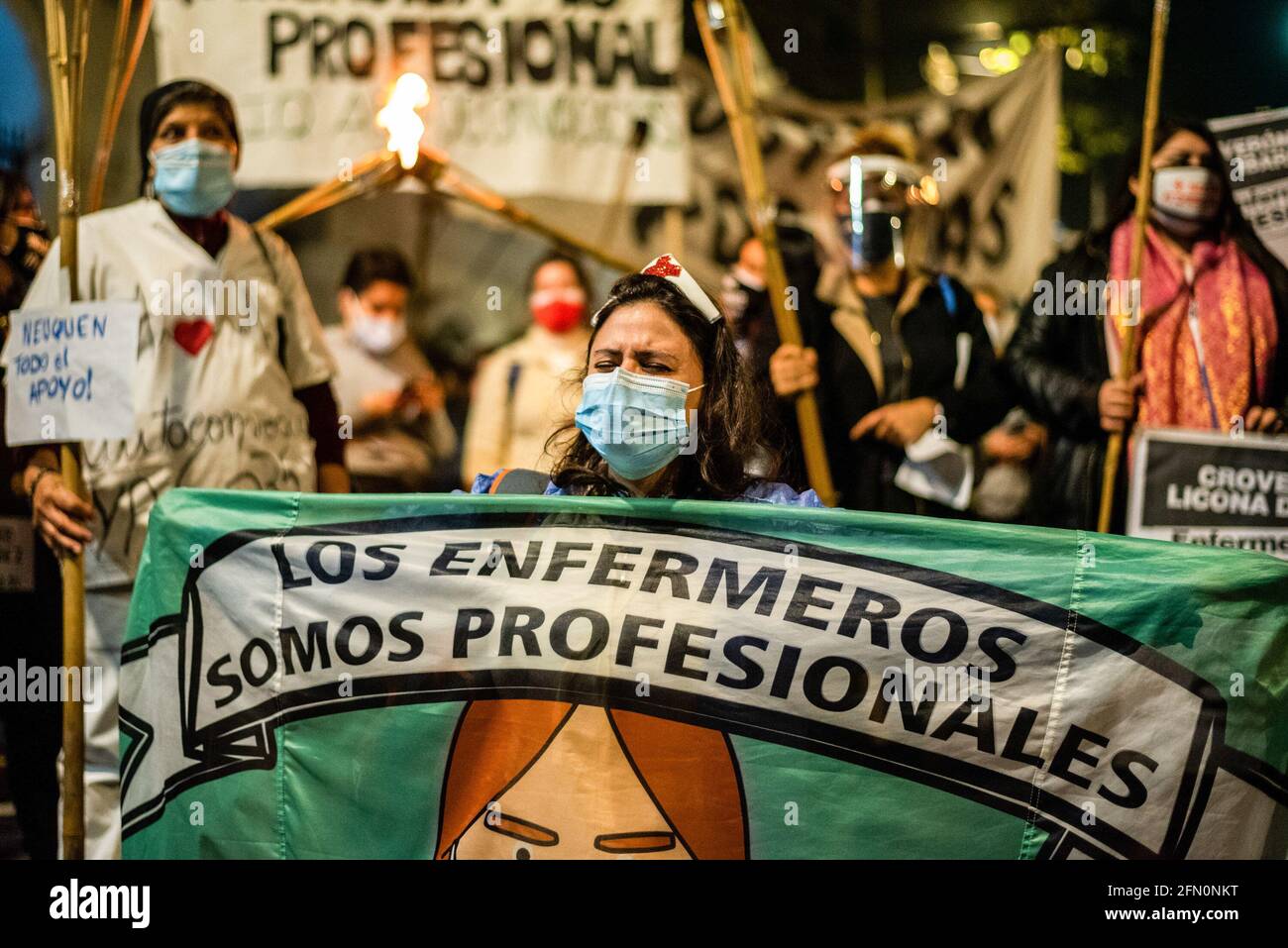 Buenos Aires, Argentina. 12th May, 2021. A nurse holds a banner with ...