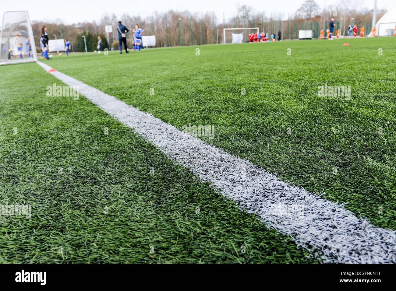 Green grass on outdoor stadium, selective focus. sport and games ...