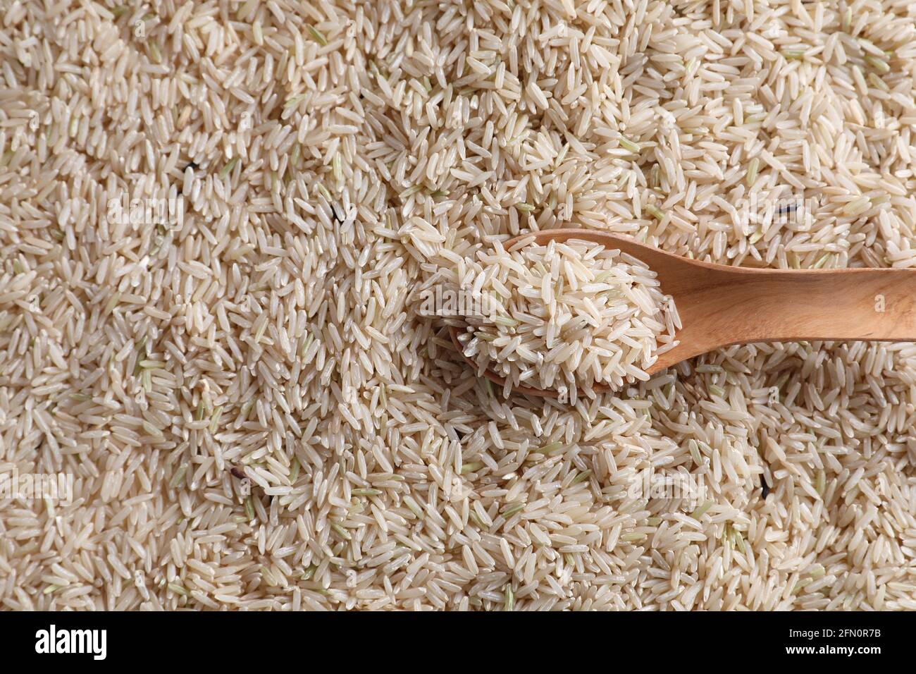 Raw brown rice hi-res stock photography and images - Alamy