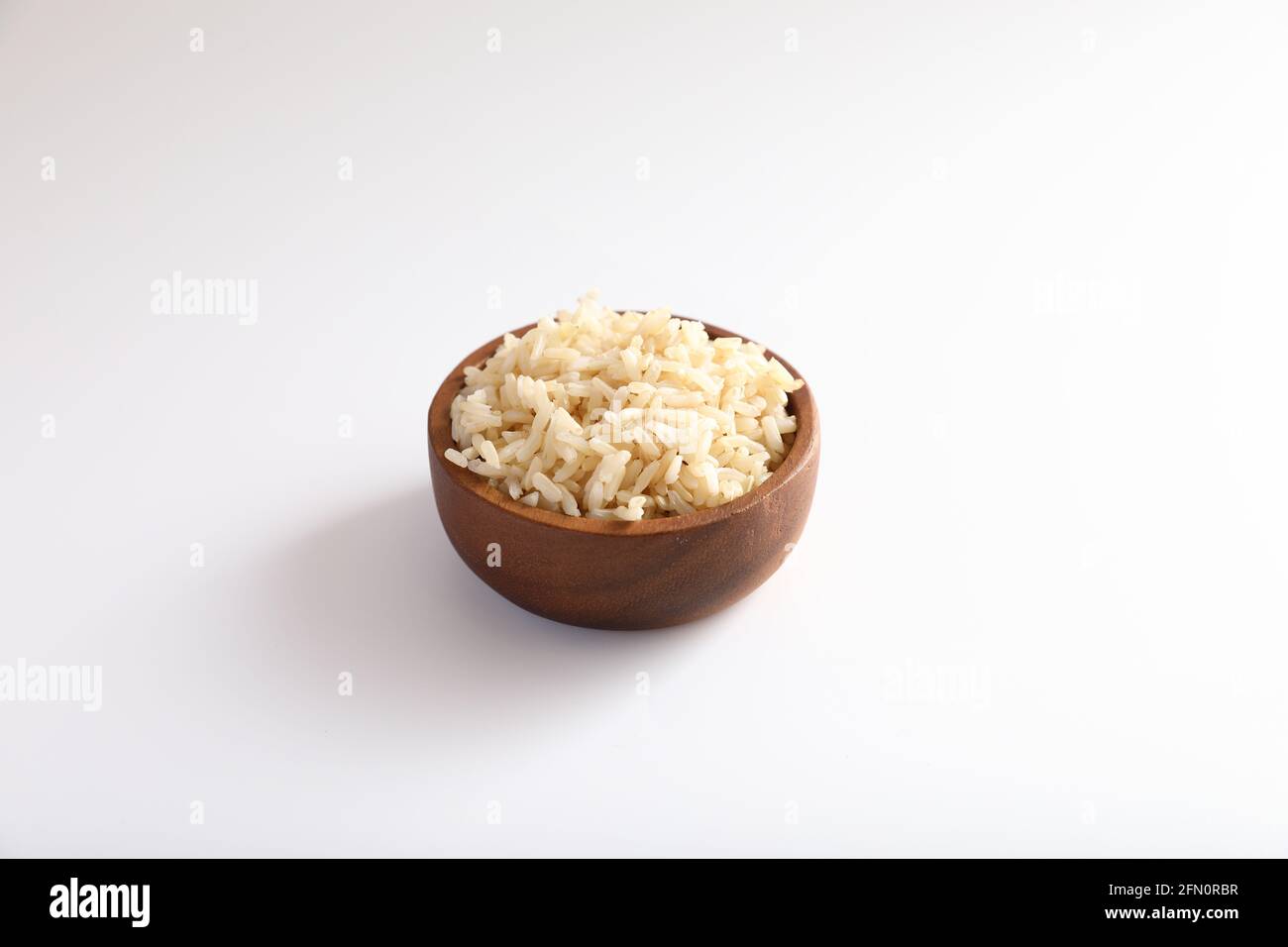 Organic boiled brown rice on bowl in close up Stock Photo - Alamy