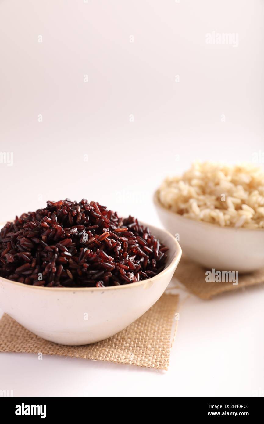 Organic boiled brown rice on bowl isolated in white background Stock ...