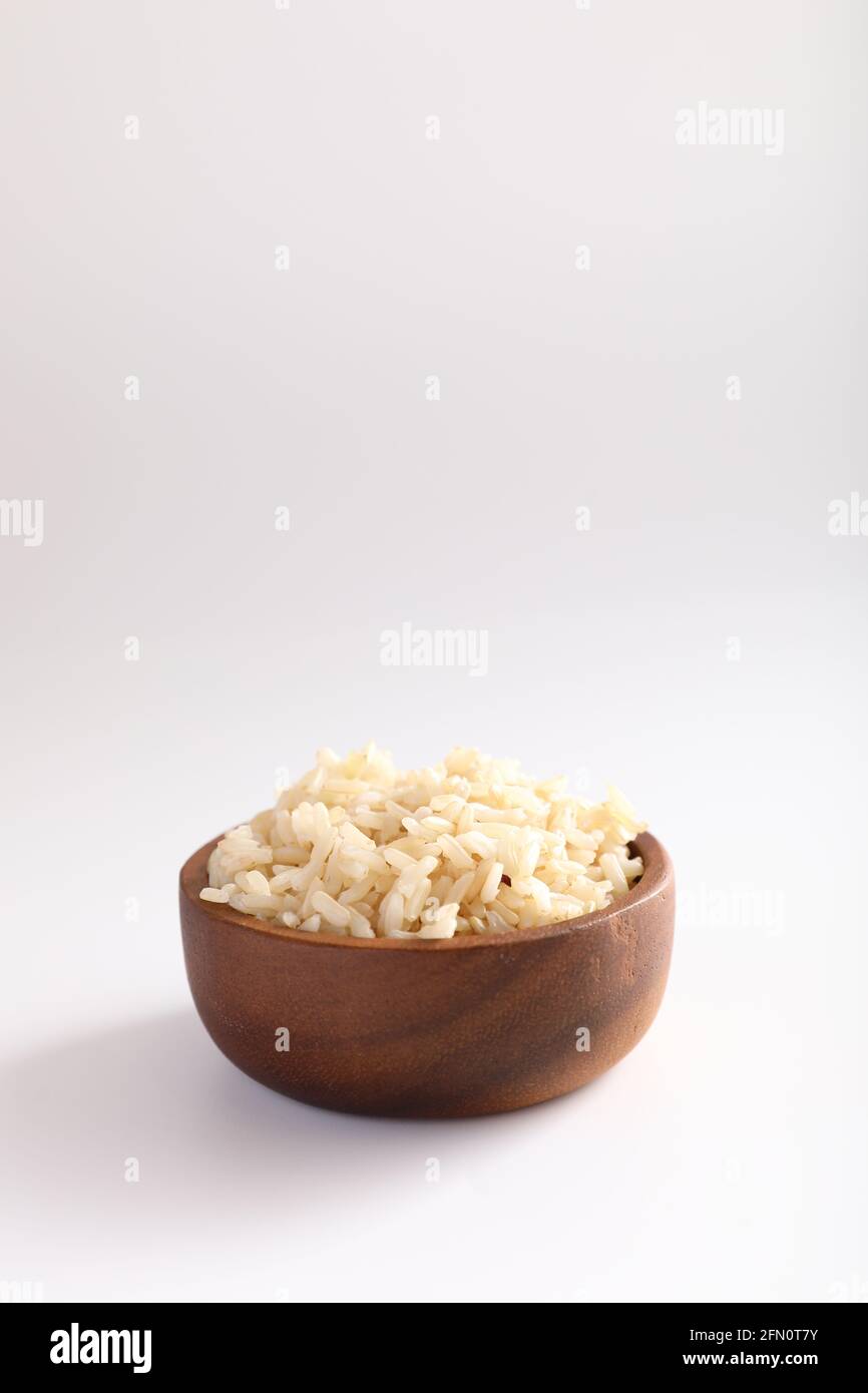 Organic boiled brown rice on bowl in close up Stock Photo - Alamy