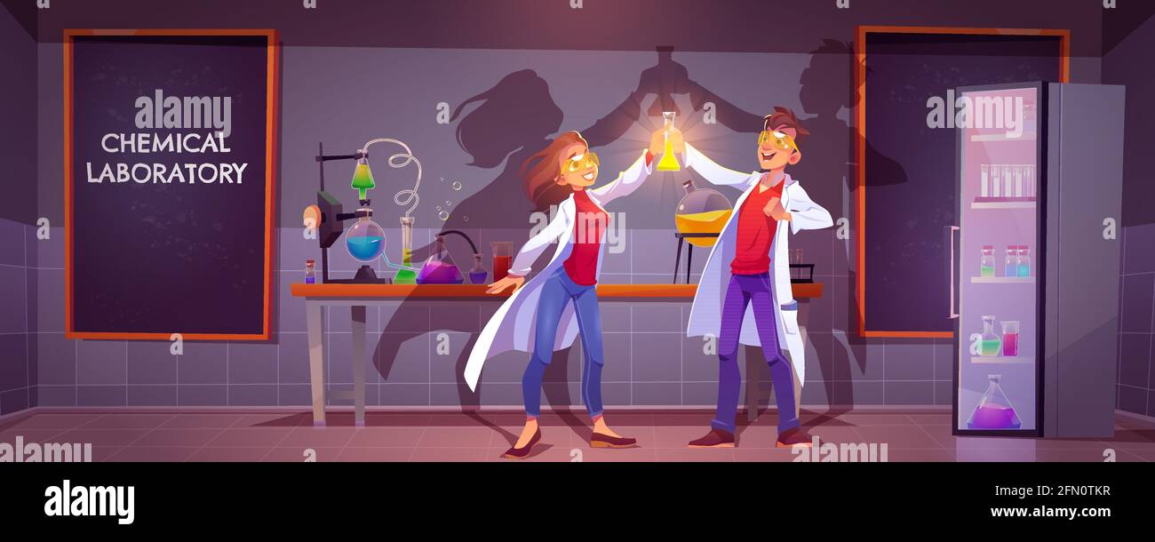 Happy chemists in chemical laboratory holding glass flask with glow ...
