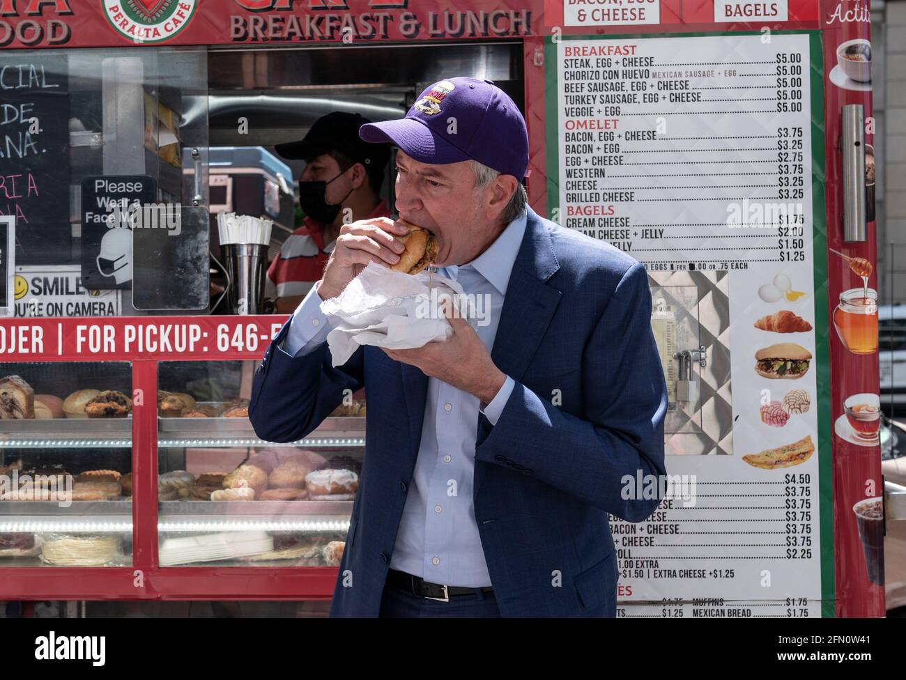 New York, NY - May 12, 2021: Mayor Bill de Blasio eats for lunch Tortas ...