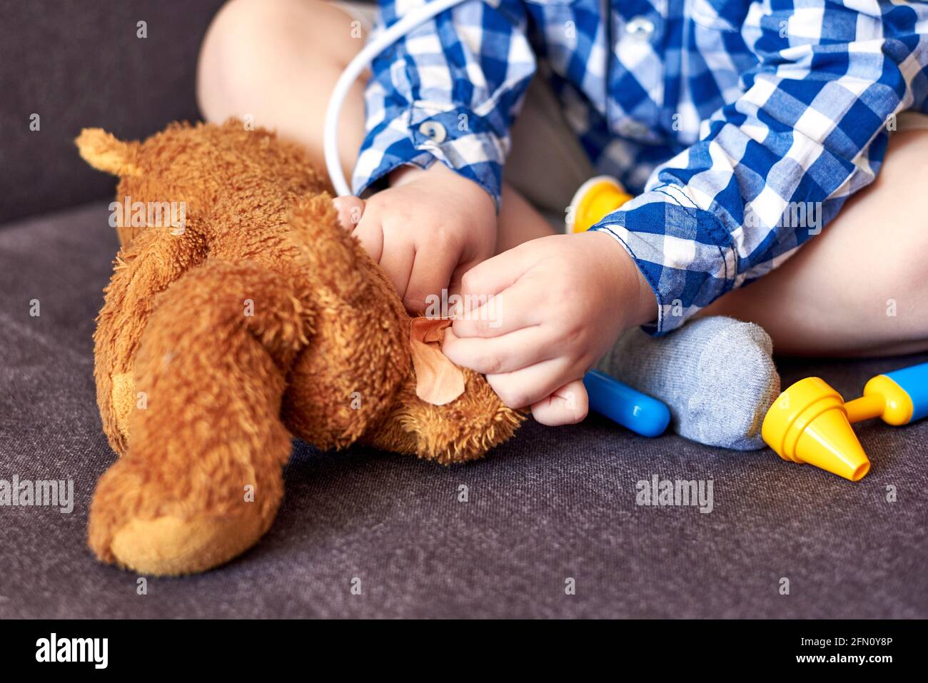 Cute little teddy bear plaster hi-res stock photography and images - Alamy