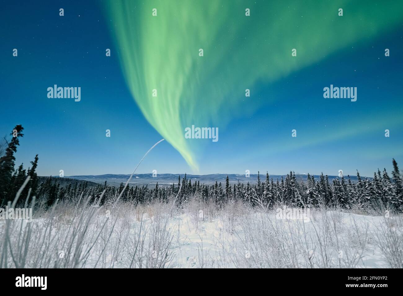 Spring aurora over the hill Stock Photo - Alamy