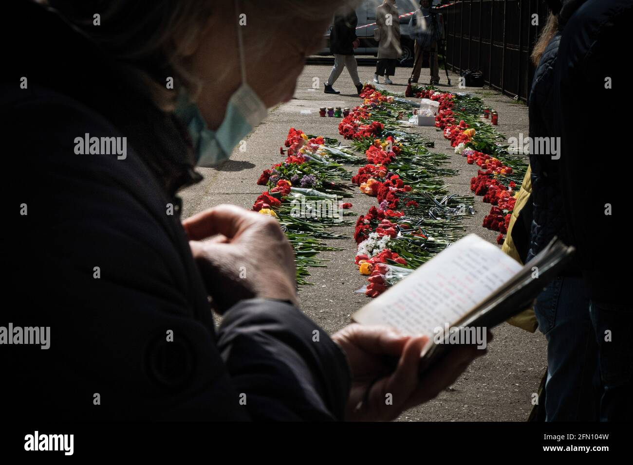 Odessa, Ukraine. 2nd May, 2021. A man prays during the commemoration of ...