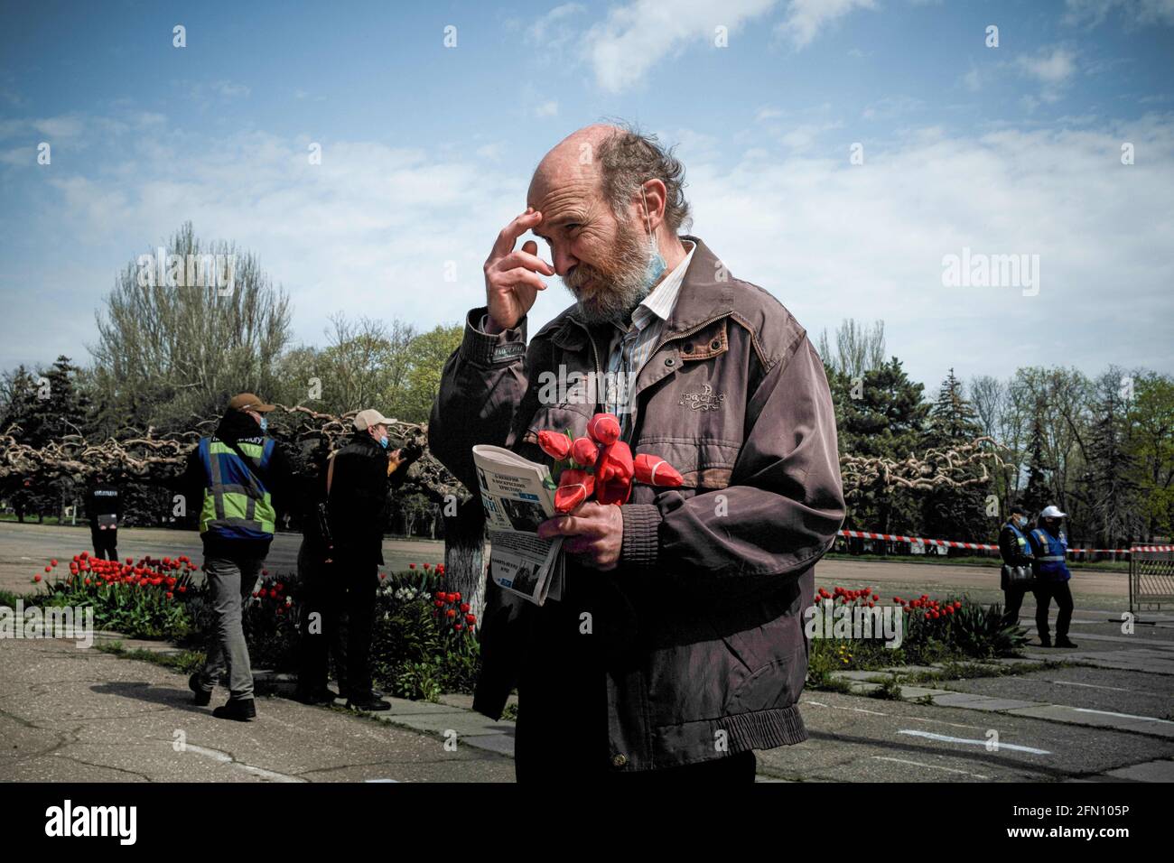 Odessa, Ukraine. 2nd May, 2021. A man prays during the commemoration of ...